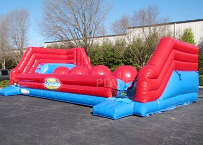 Red Balls Inflatable Sports Games Wipe Out Interactive Obstacle Course